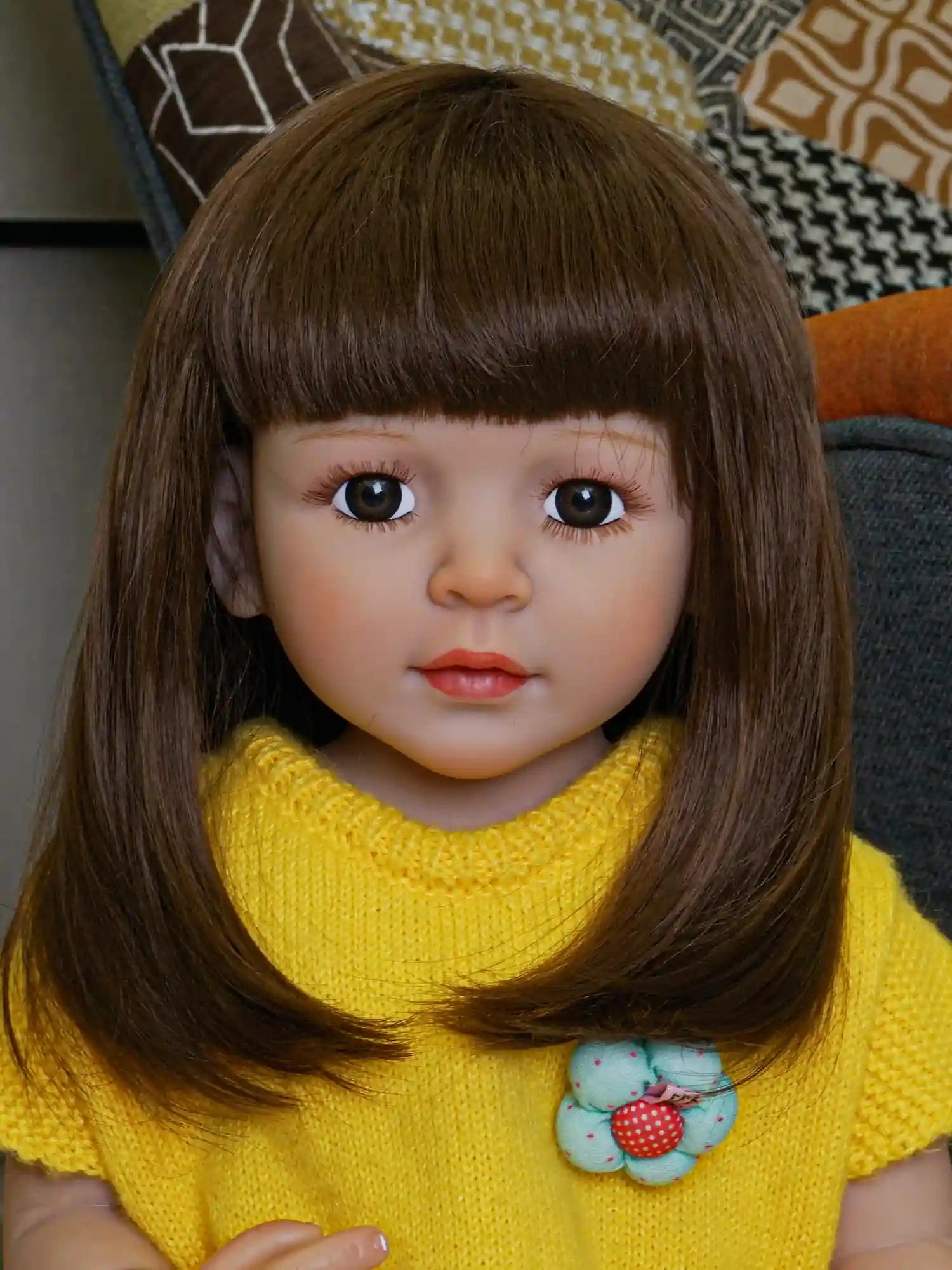 Chimidoll - playful toddler doll in a yellow outfit with long hair