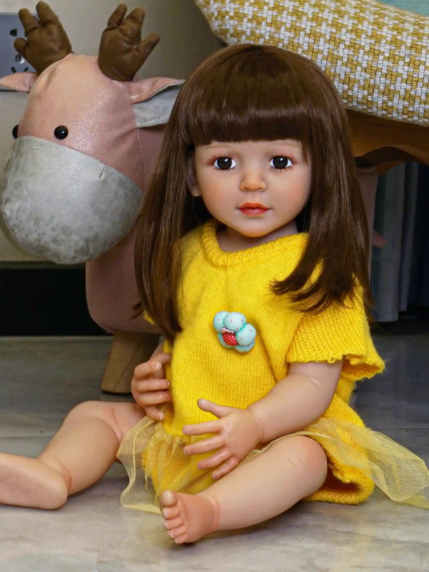 Chimidoll - playful toddler doll in a yellow outfit with long hair